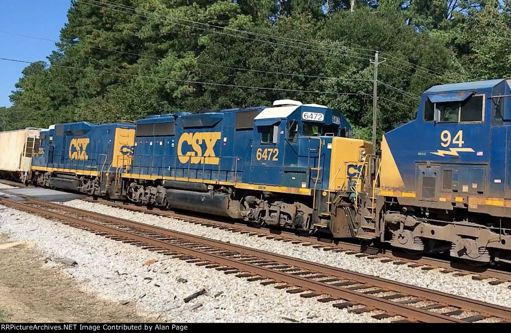 CSX GP40-2 6472 and mate 2324 assist a trio of road units
